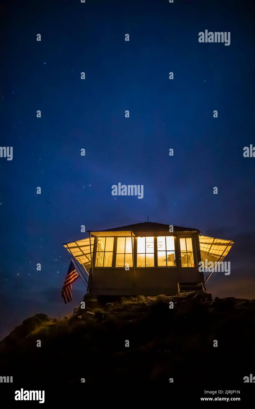 Twilight at Evergreen Mountain Lookout, with visitors renting the ...