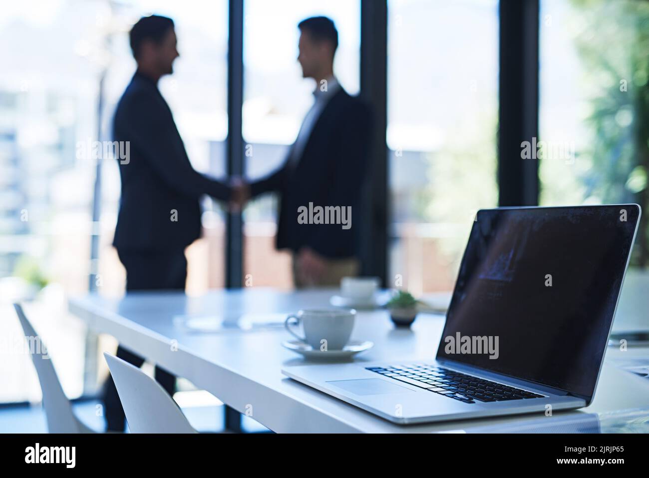 Taking business to the next level. a laptop on a table in an office ...