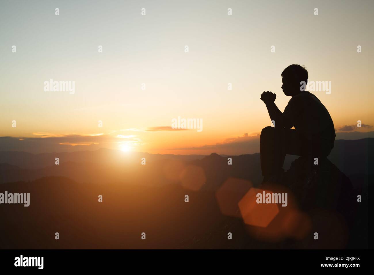 Raised praying hands hi-res stock photography and images - Alamy