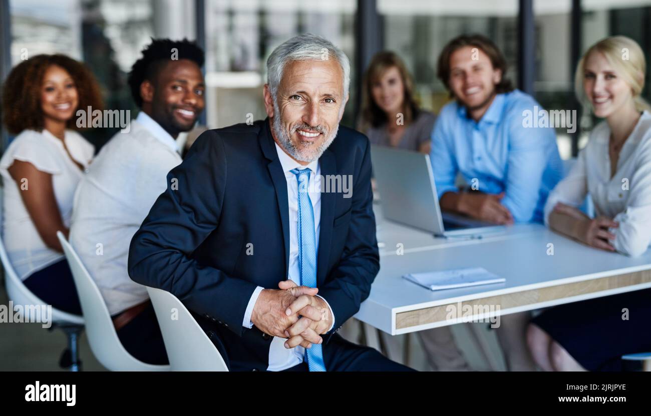 Productivity facilitated by the expert himself. Portrait of a team of ...