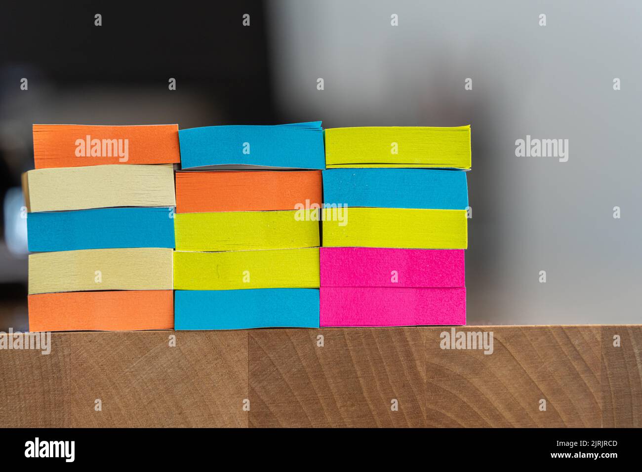 pile of sticky notes on office table at work Stock Photo - Alamy