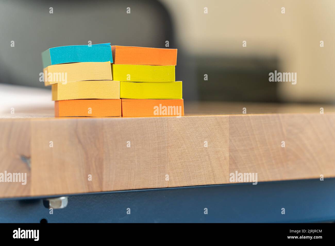 pile of sticky notes on office table at work Stock Photo - Alamy