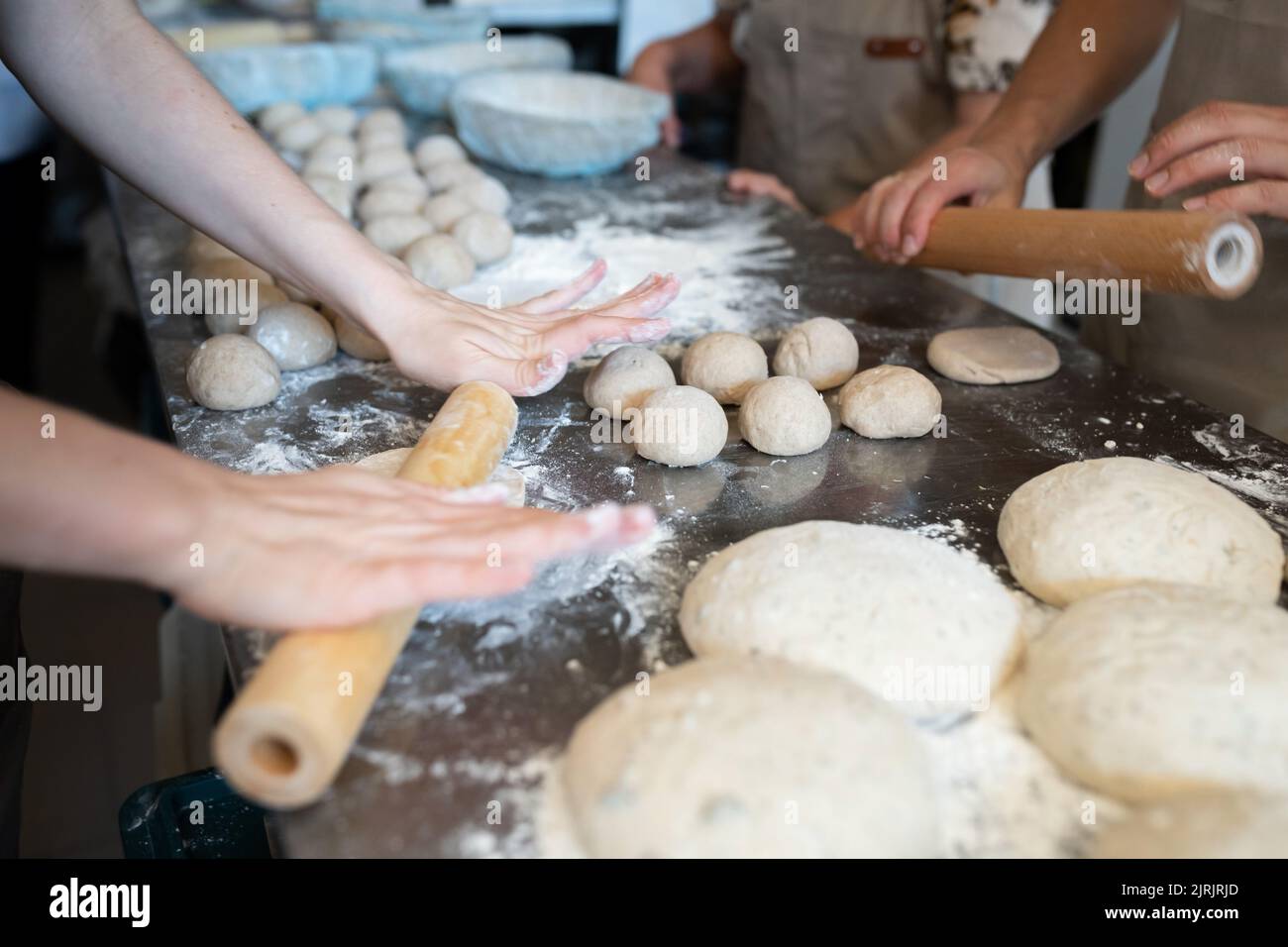 The process of learning how to produce artisan bread in a small bakery ...
