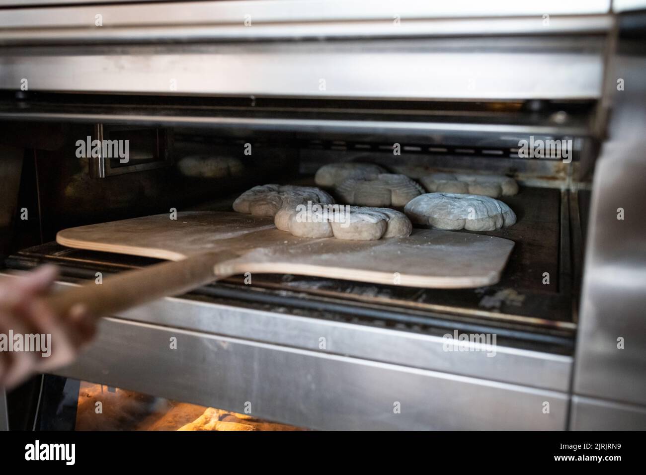 The process of making traditional French bread in an artisan bakery ...