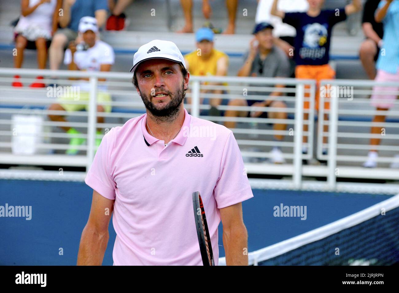 French tennis player Gilles Simon plays and wins his qualification game ...