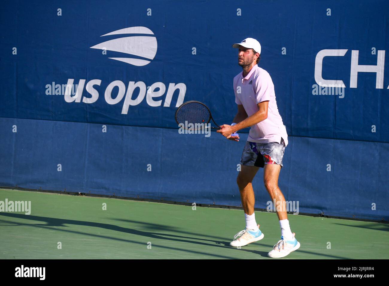 French tennis player Gilles Simon plays and wins his qualification game ...
