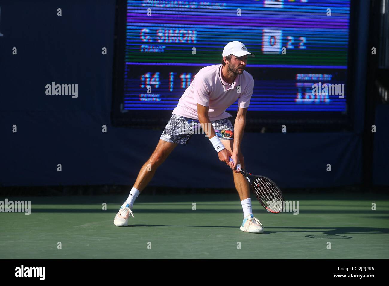French tennis player Gilles Simon plays and wins his qualification game ...