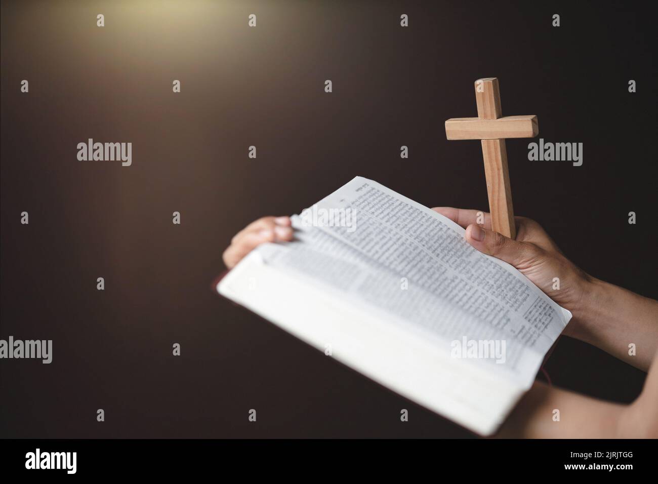 A woman reading the bible And pray for God's blessing with faith in His ...