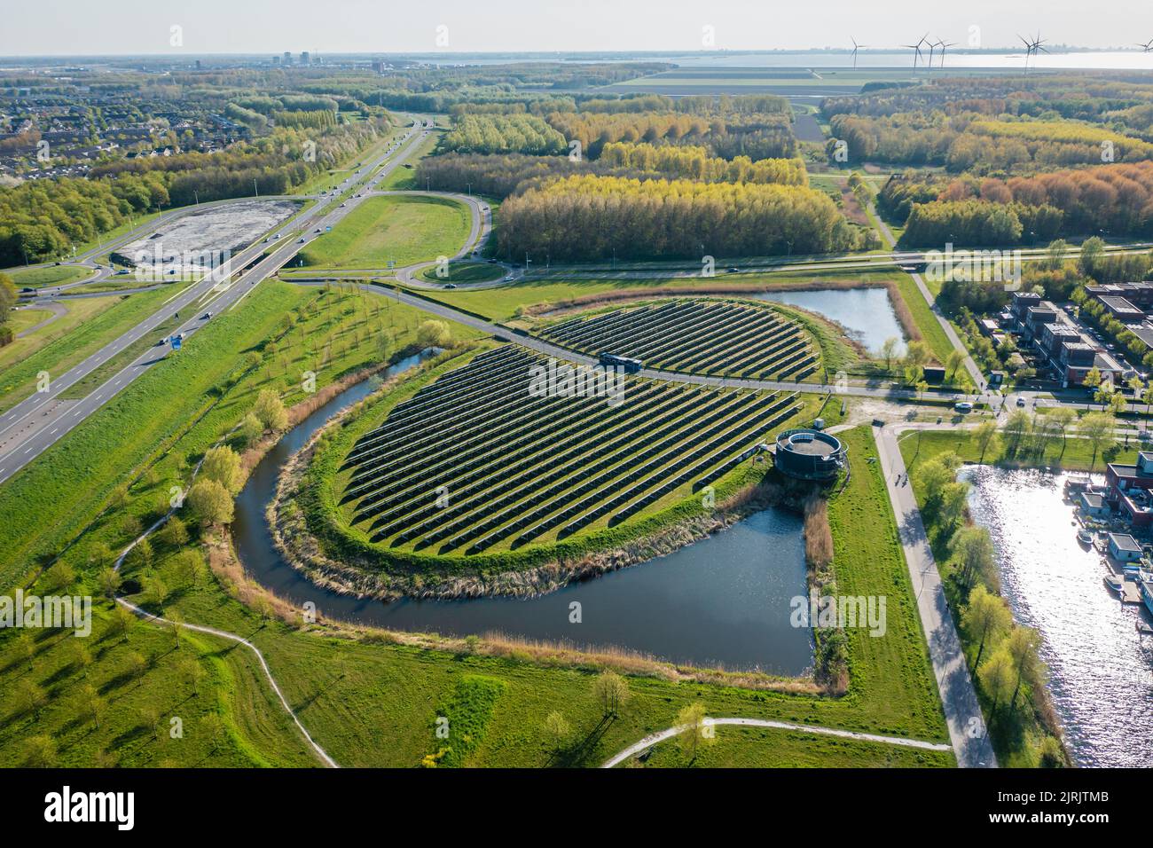 Solar panel farm in a form of an "island" in a residential area in ...