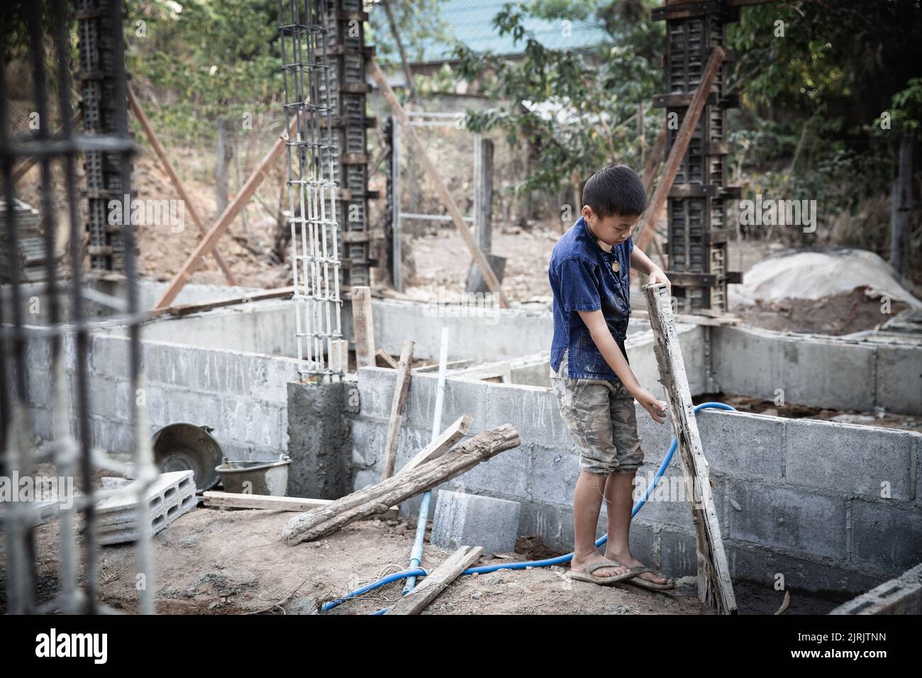 Children working at construction site. Concept against child labor and ...
