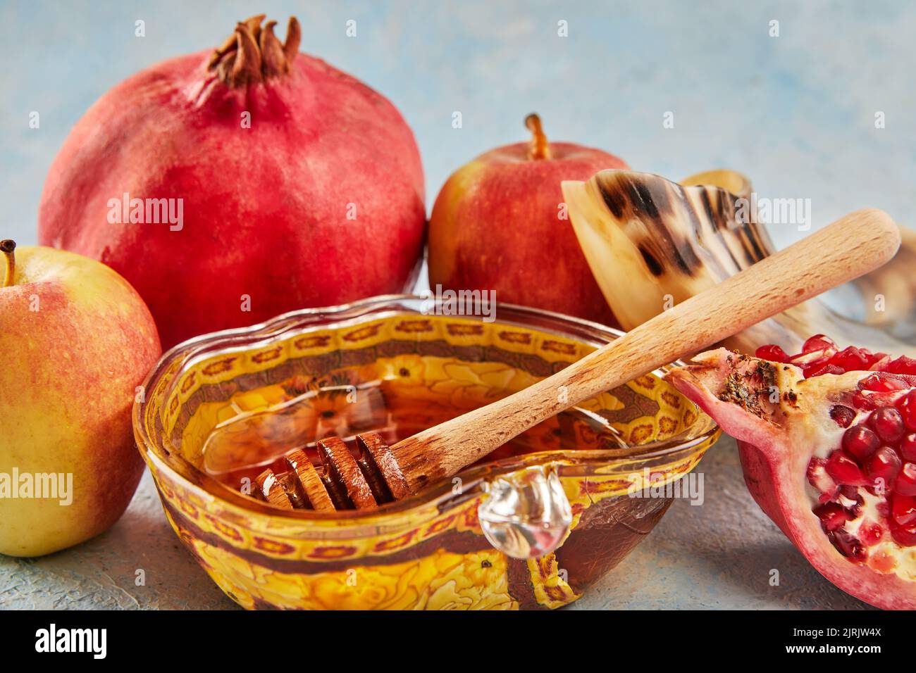 Rosh hashanah - jewish new year holiday concept. Apple-shaped bowl with ...