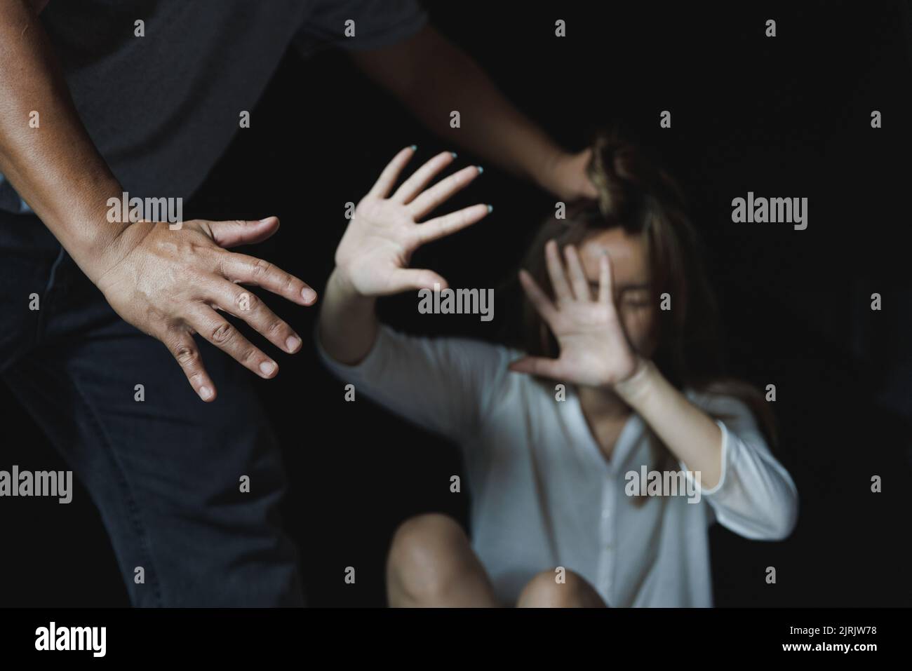 Man Are Using Force To Coerce Woman Scared Woman Lift Hand Up For Say Stop To Protect Herself