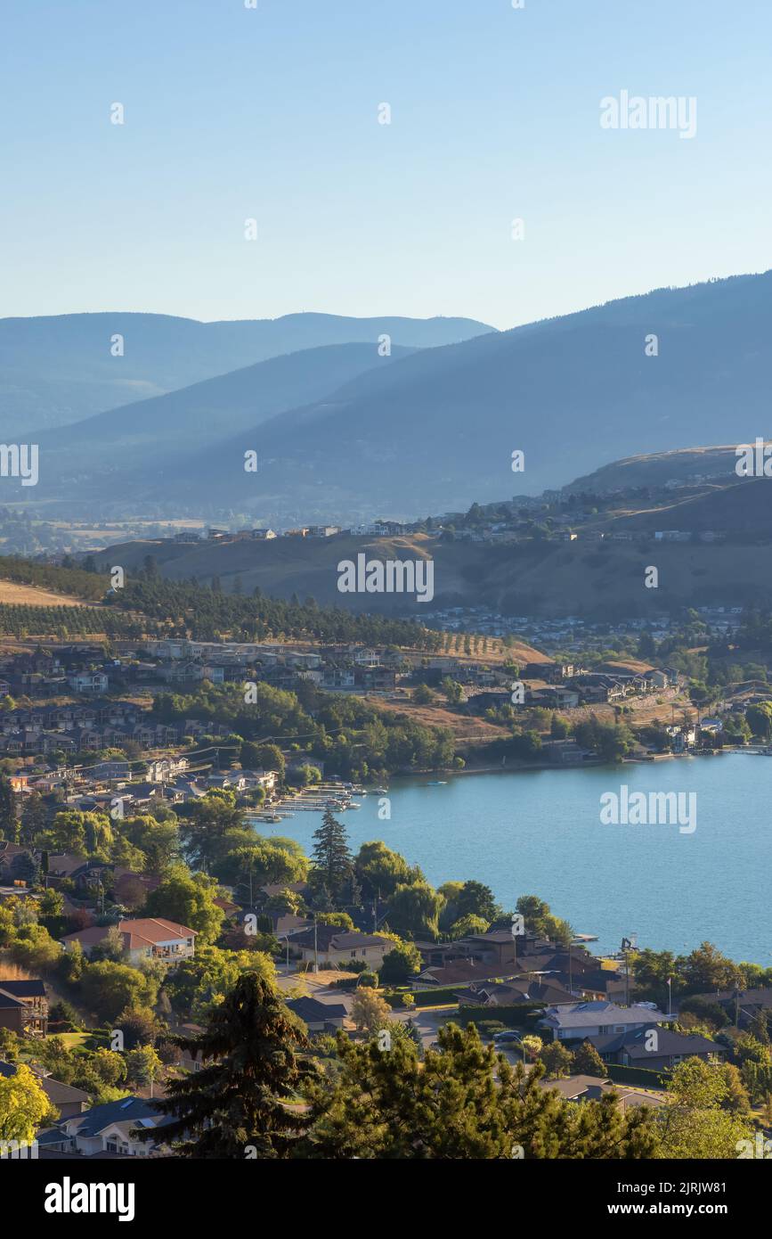 Scenic View of Kalamalka Lake and a small City during sunny summer ...