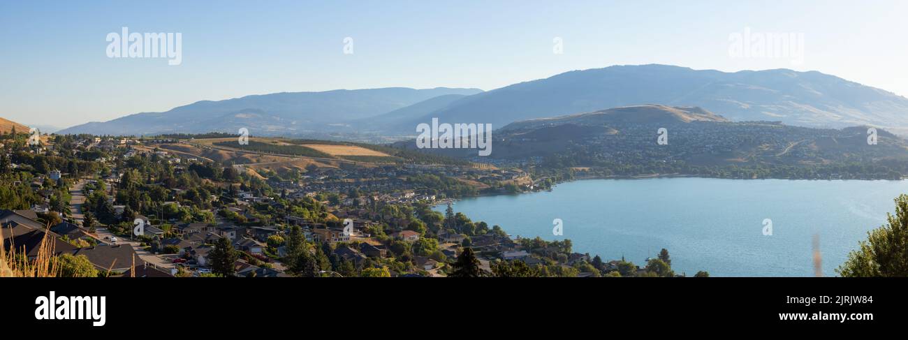 Scenic View of Kalamalka Lake and a small City during sunny summer ...