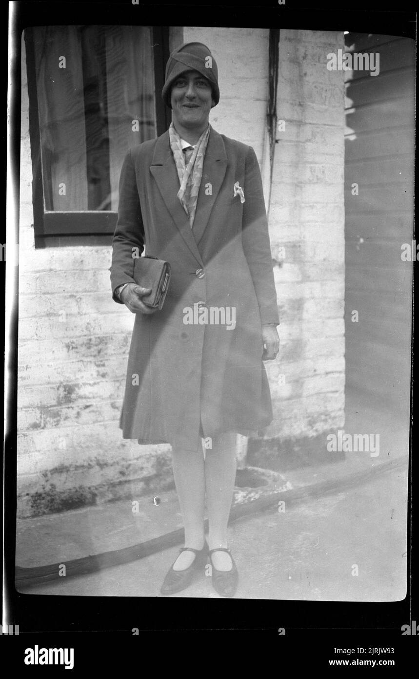 Woman dress standing background Black and White Stock Photos & Images ...