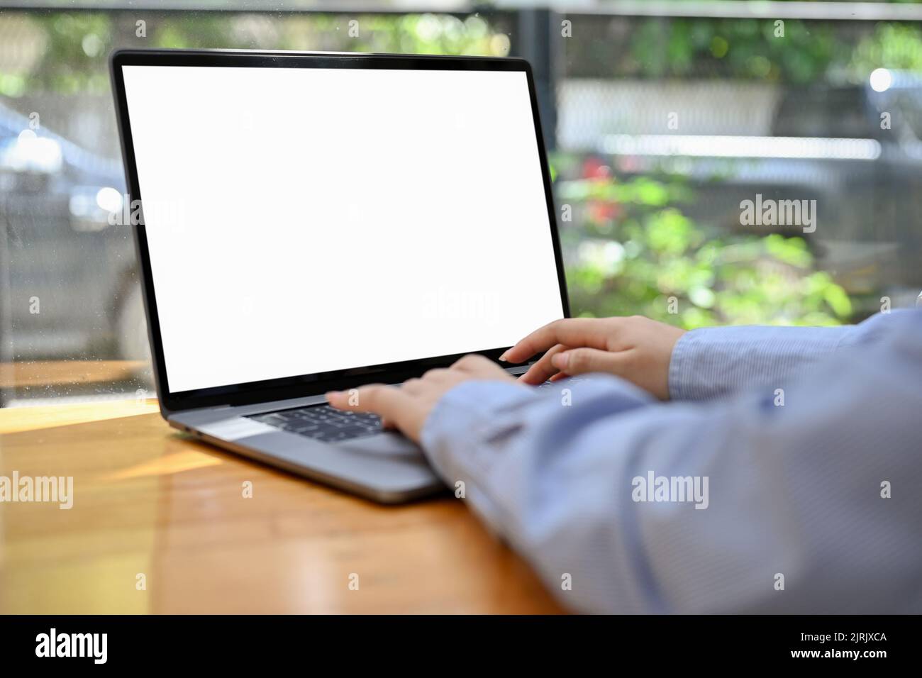 A businesswoman or female office worker remote working at the coffee ...