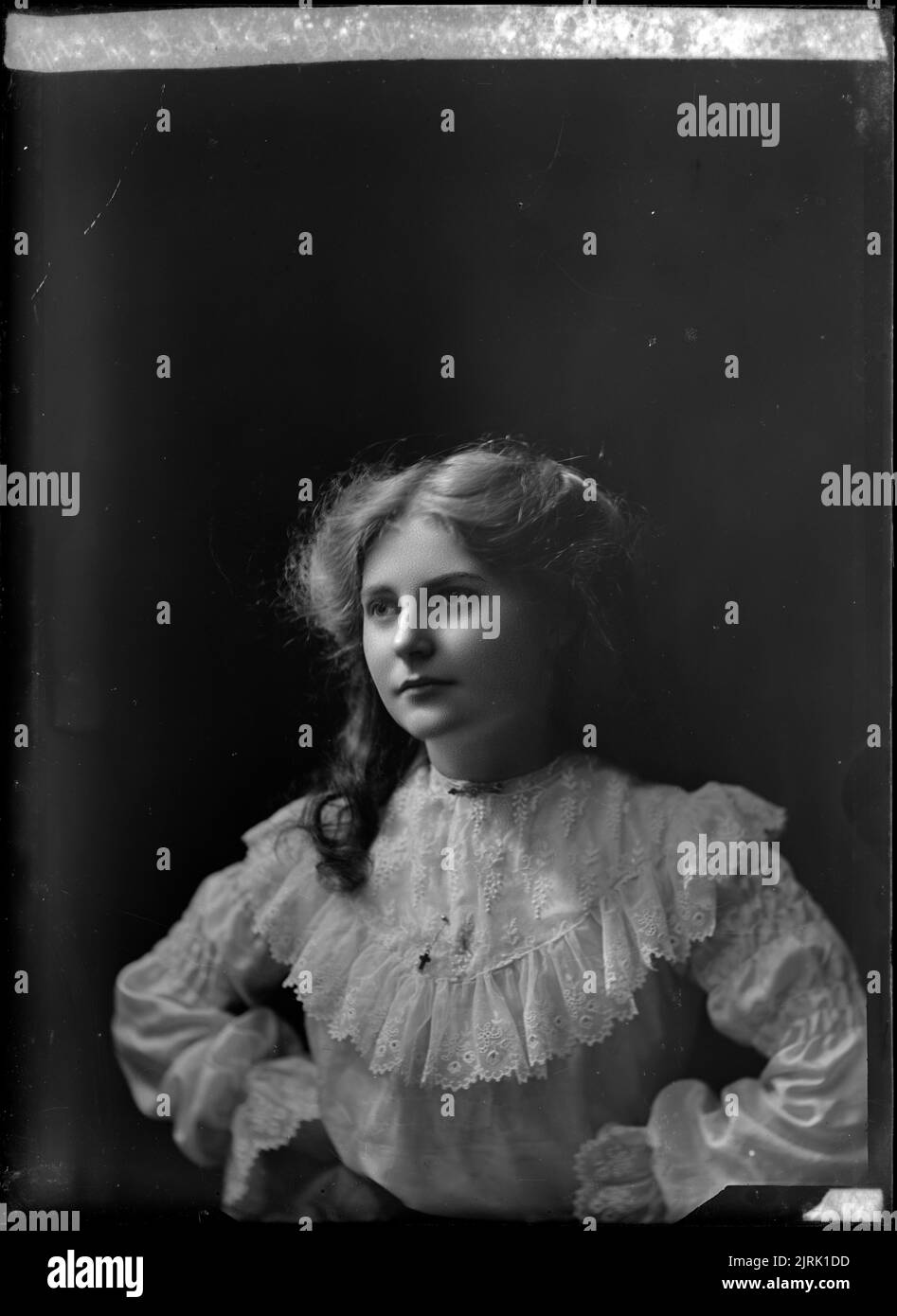 Girl with hands on hips, 1900-1917, Dannevirke, by Alfred Henderson Stock Photo - Alamy