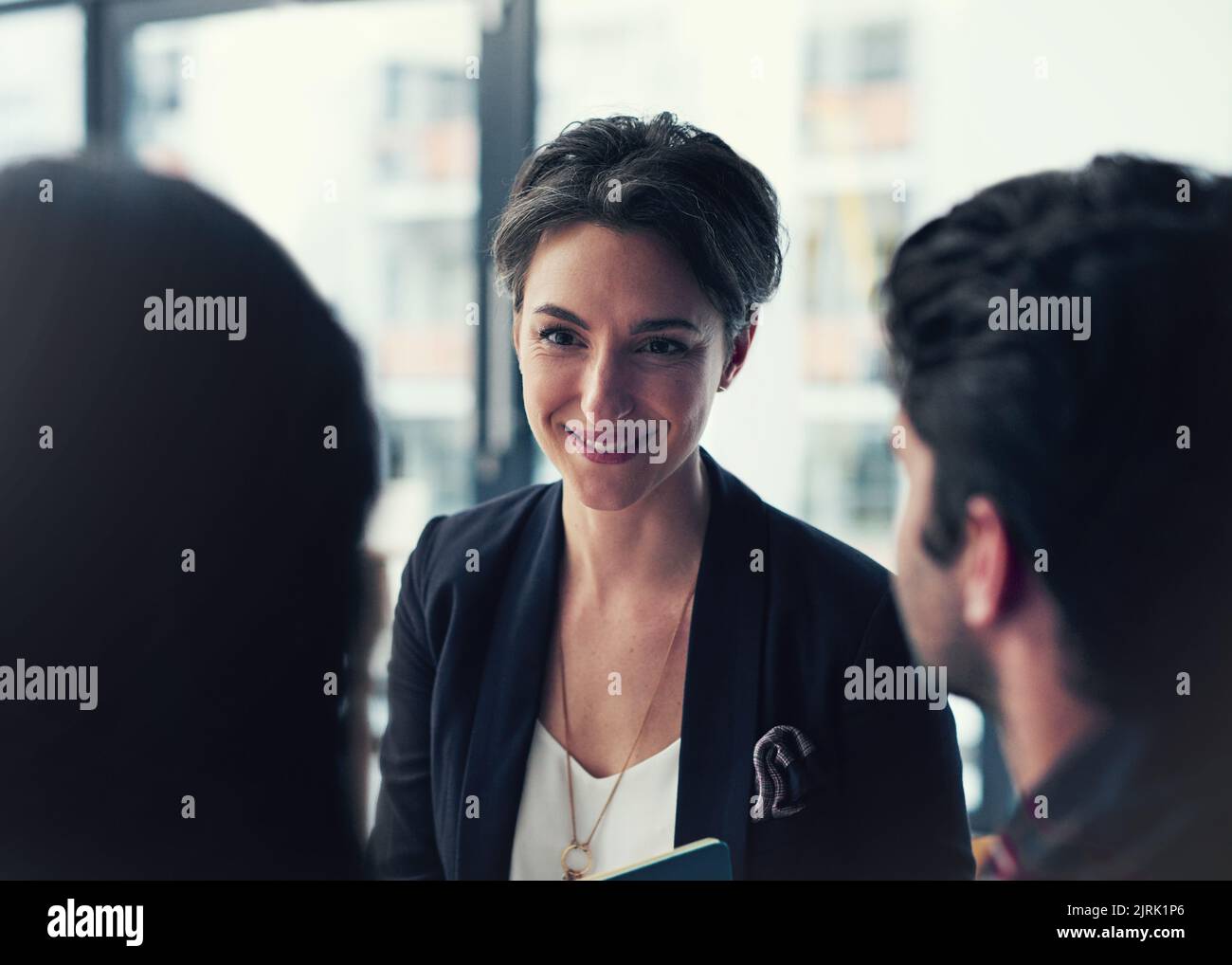 Making time to connect as a team. a group of colleagues having a ...