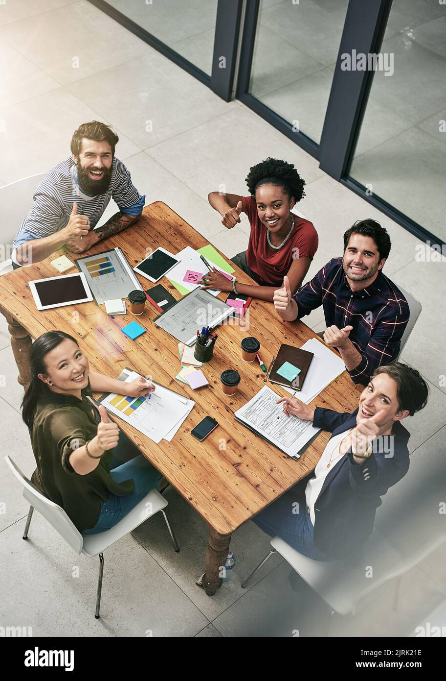 We win when we work as one. High angle portrait of a group of ...