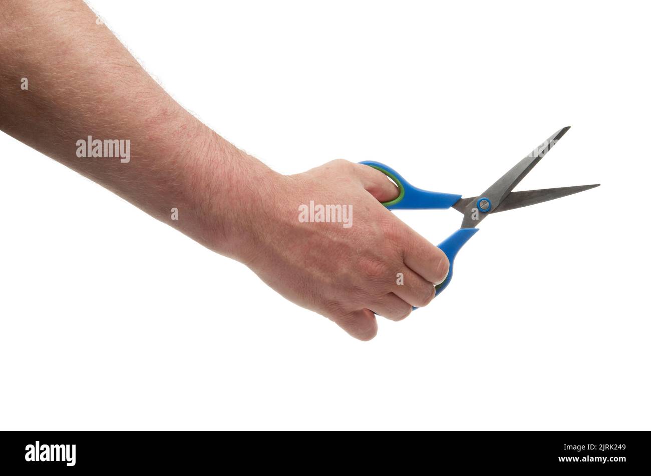 Hand with metal scissors with blue plastic handles. Isolated on white ...