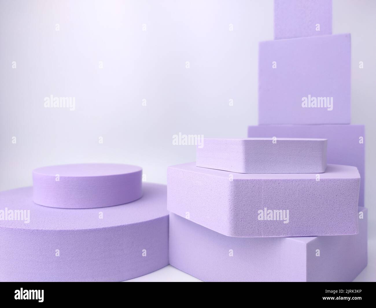 A 3D rendering of violet podiums on white background Stock Photo - Alamy