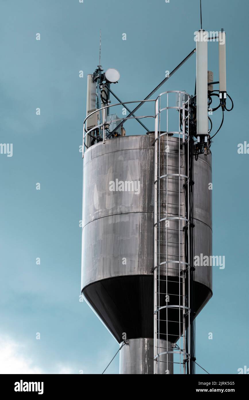 Tall Metal silver water tower ice cream factory Sandriliona blue ...
