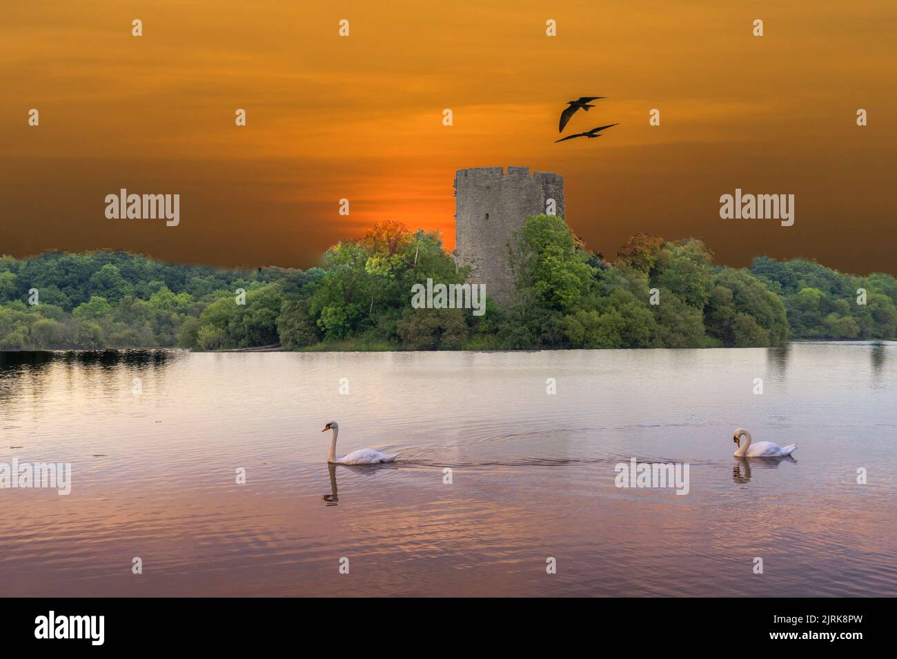 A dreamy landscape with a castle and sunset sky, behind a tranquil lake ...