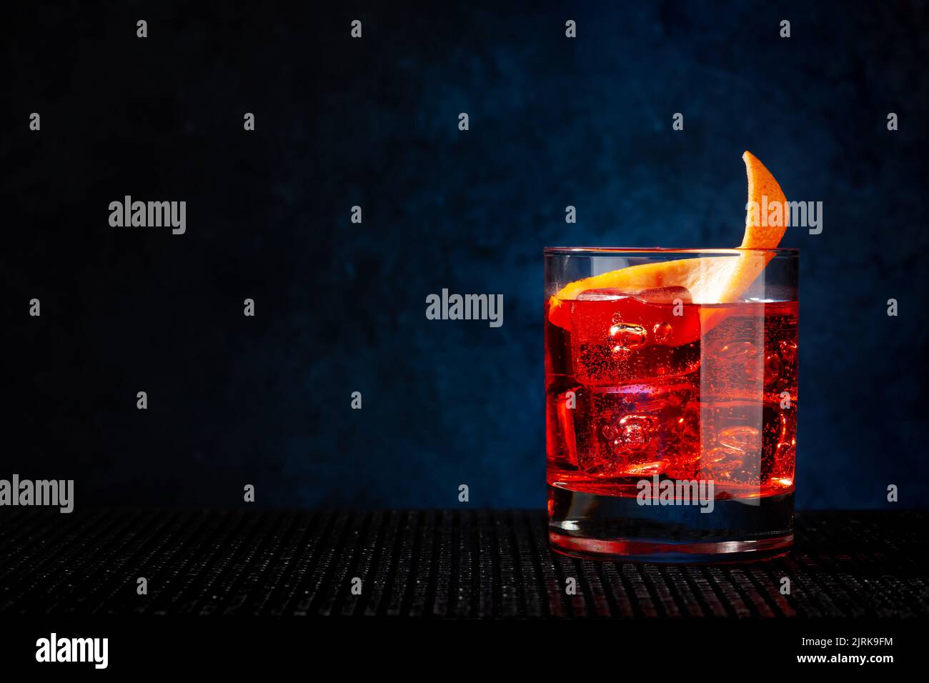 Negroni cocktail on dark background with copy space Stock Photo - Alamy
