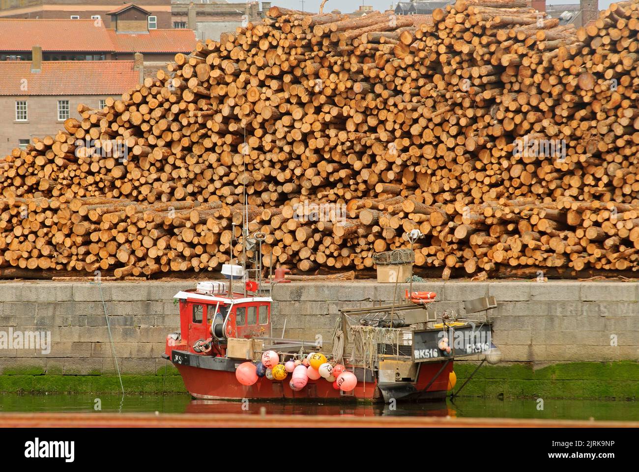 Shipping timber loading boat hi-res stock photography and images - Alamy