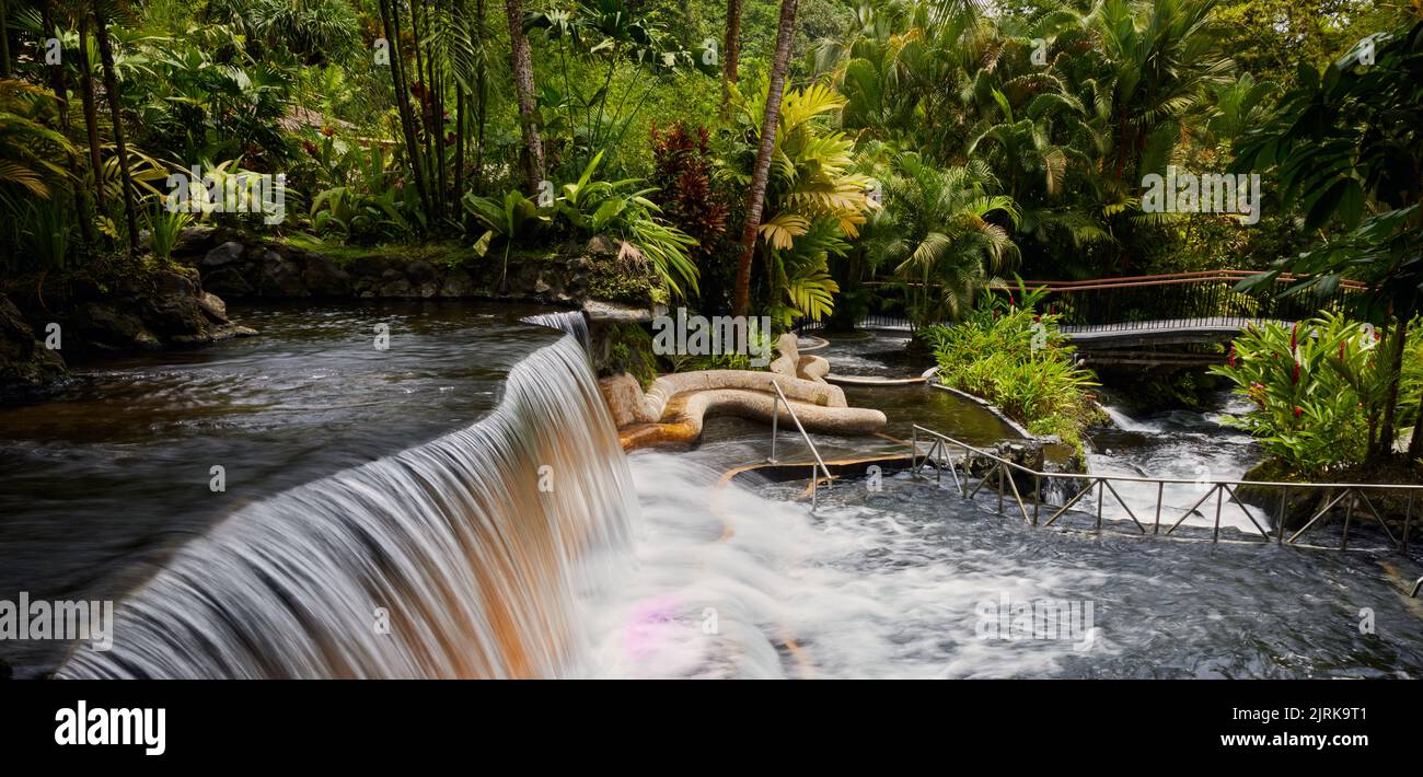 The Tabacon geothermal waterfall in La Fortuna Arenal volcano area ...