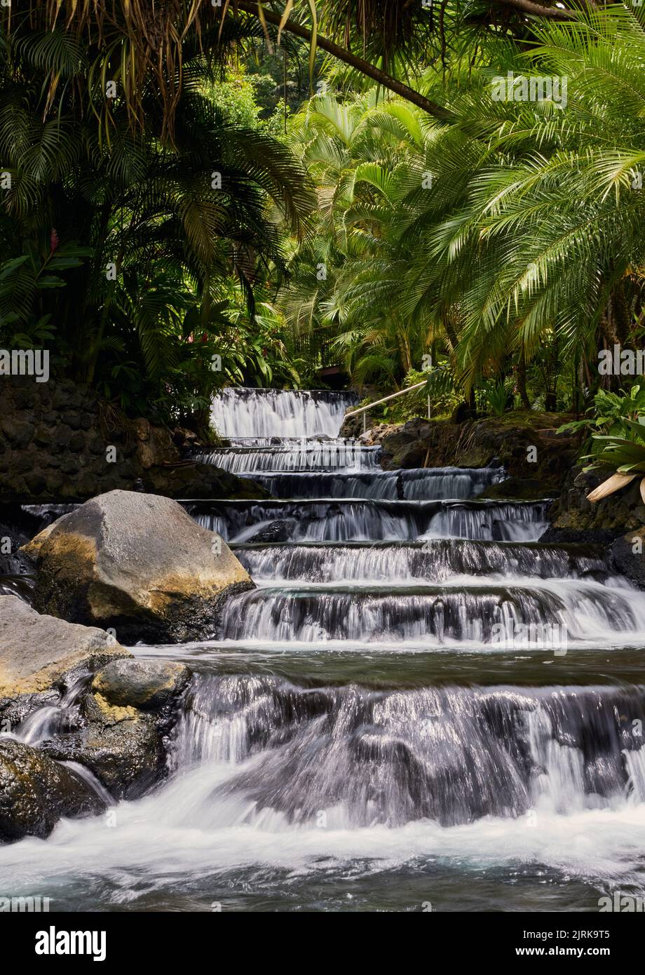 Scenic Tabacon Hot Springs in wild tropical forest, Costa Rica Stock ...