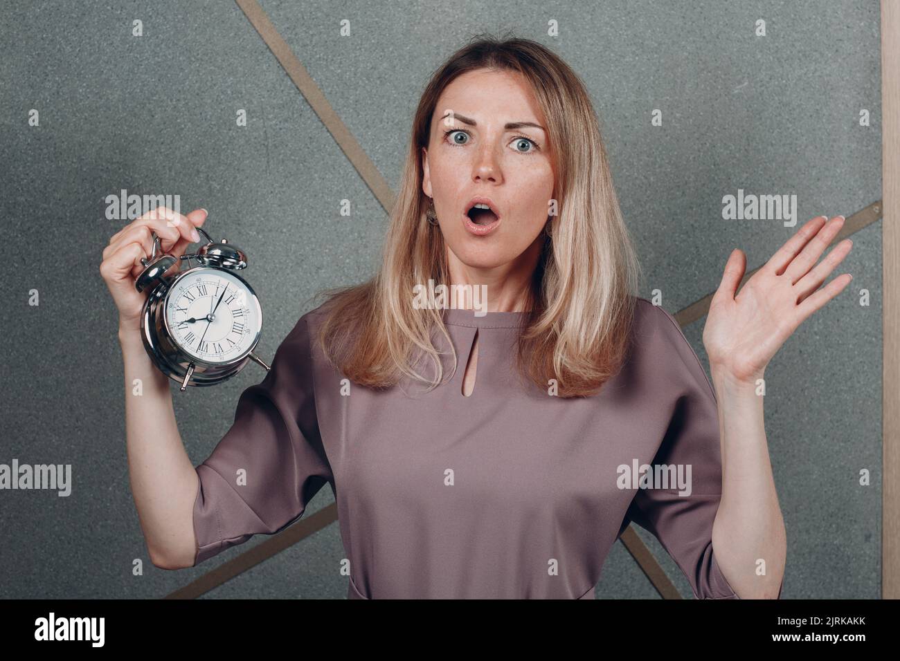 Business woman young adult coach with clock watch at office portrait ...