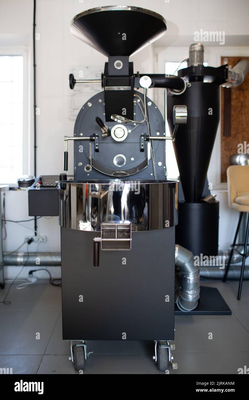 Coffee roaster machine at coffee roasting process Stock Photo - Alamy