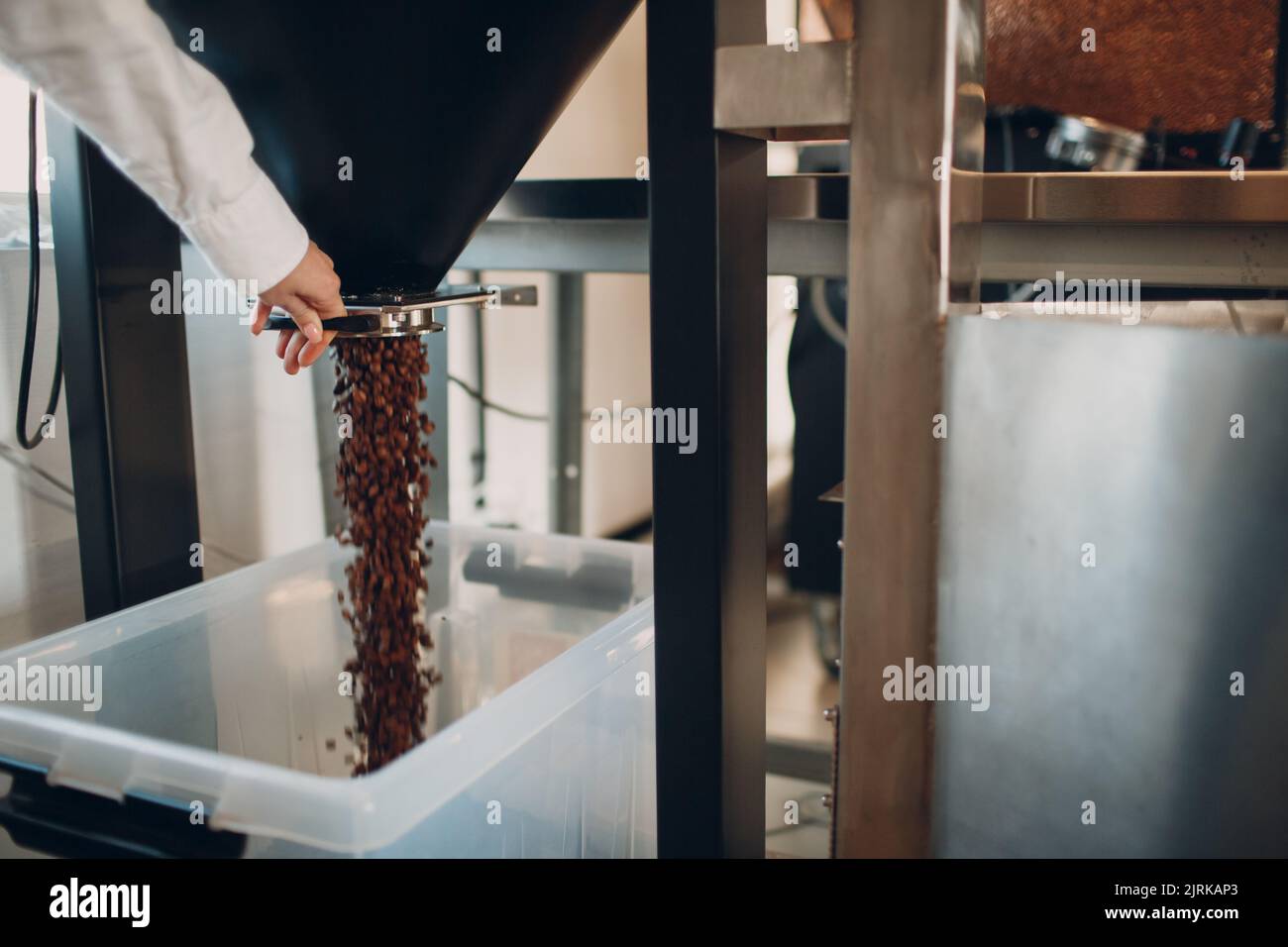 Coffee destoner machine at coffee roasting process Stock Photo - Alamy