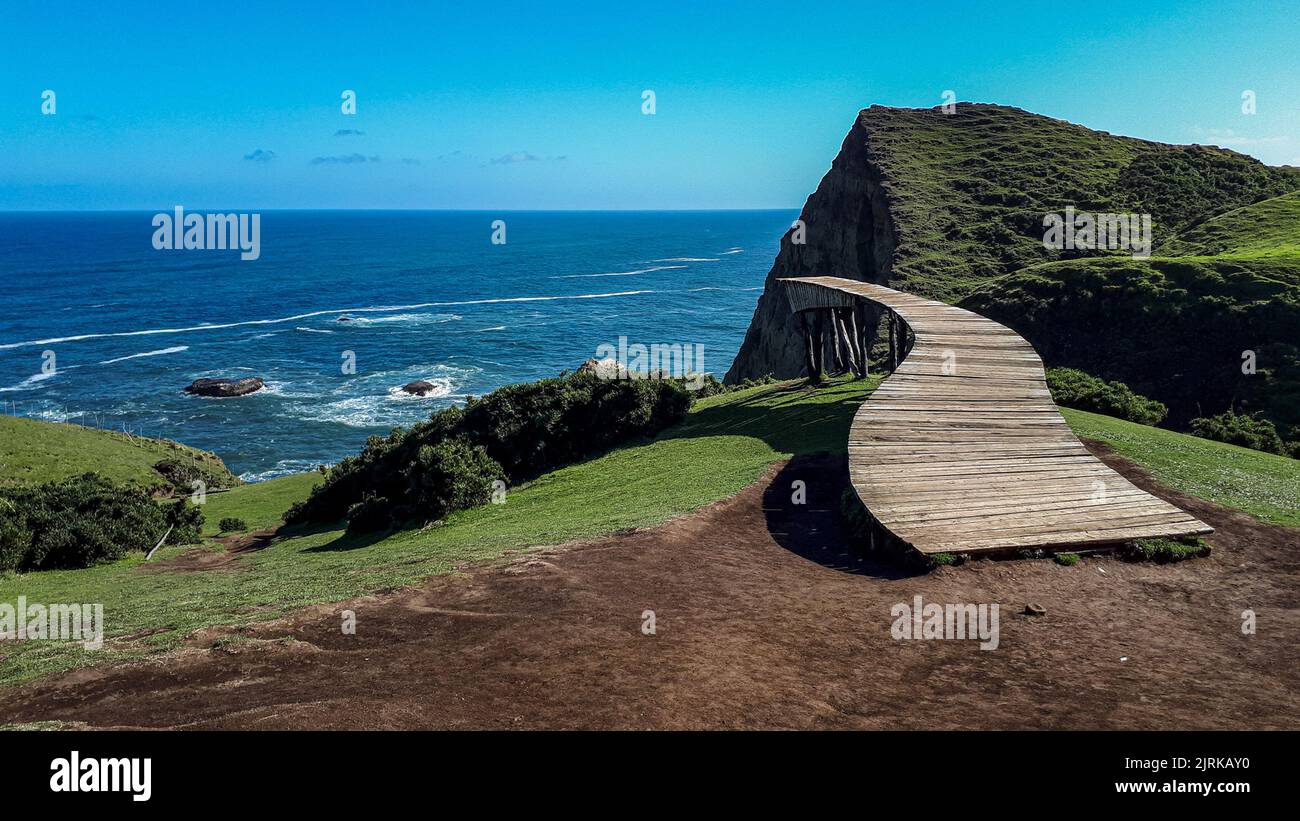 A wooden dock art installation (Dock of Souls) on Chiloe Island ...