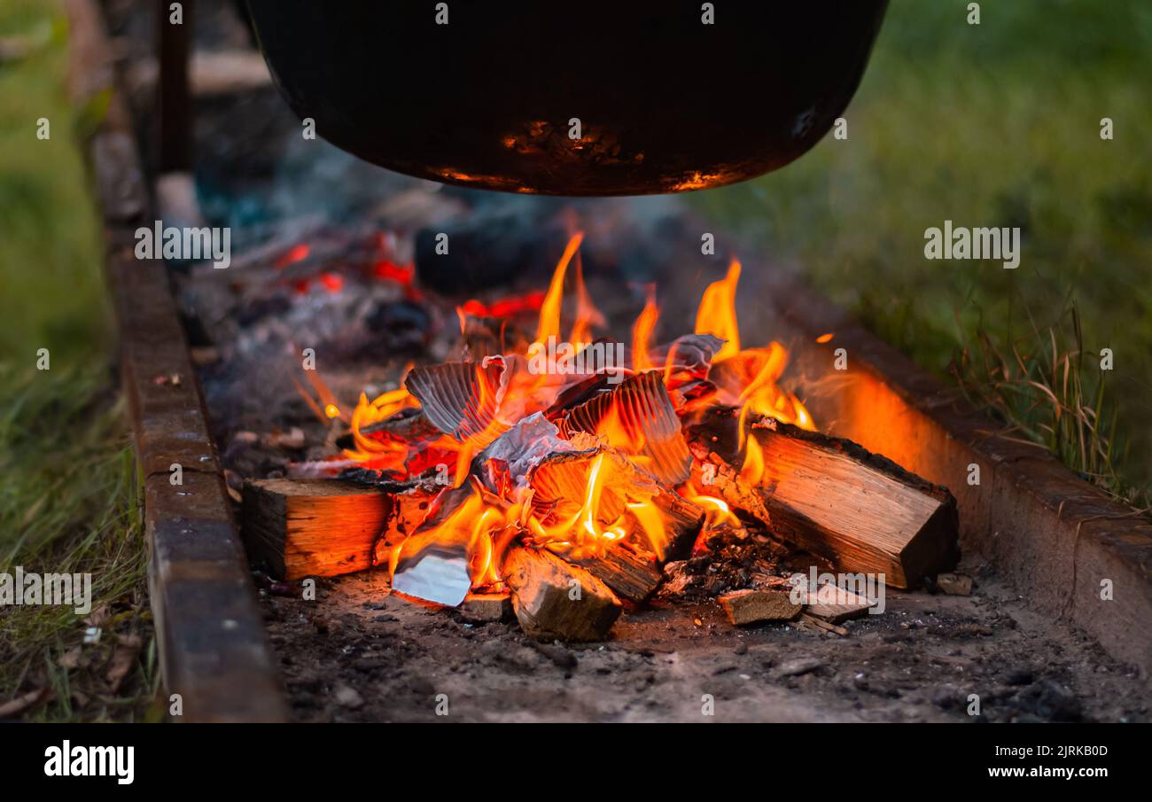 Fire Pit With Cauldron - Cooking on the beach Stock Photo - Alamy