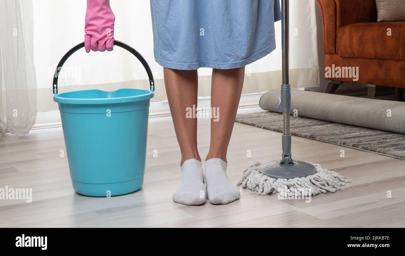 Woman mop bucket cleaning hi-res stock photography and images - Alamy