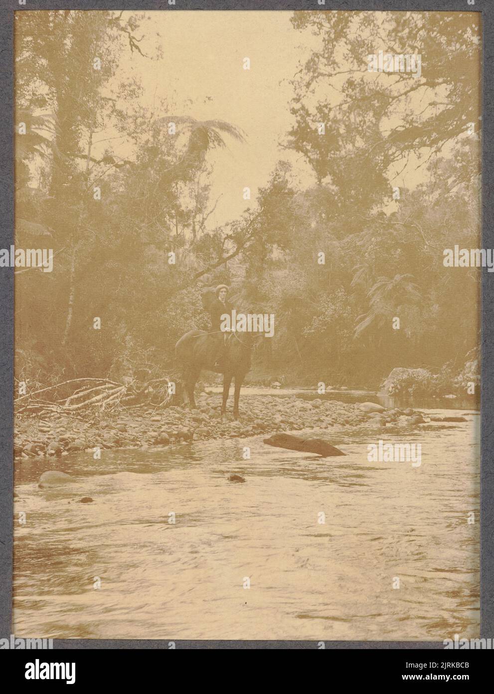 Maud riding by the Ohau River. From the album: Family photographs ...