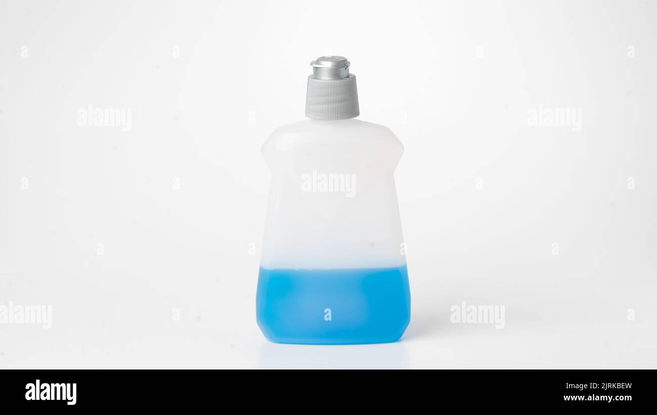Washing liquid half filled bottle on white background. High quality ...