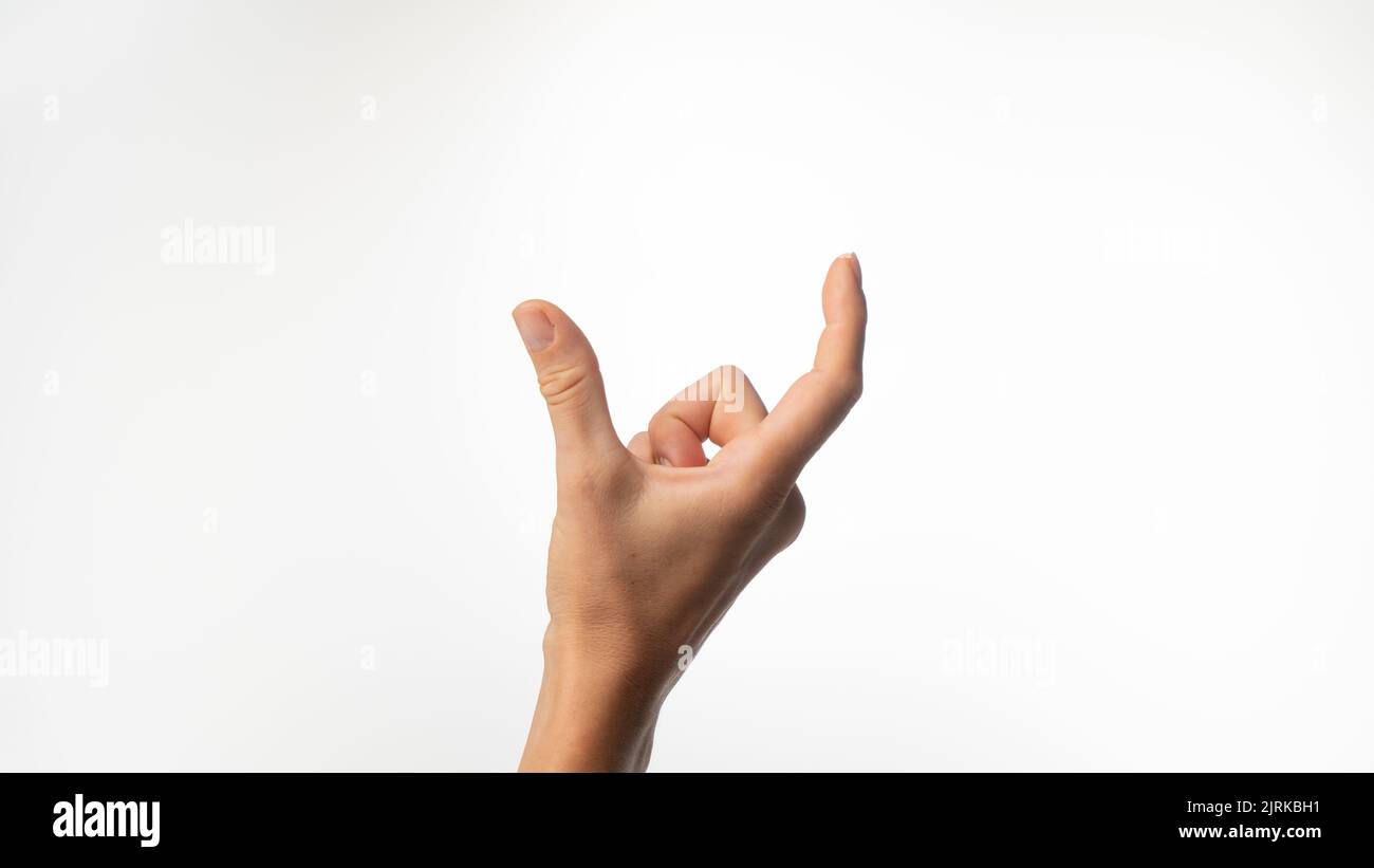 Women's fingers show large distance size on a white background. High ...