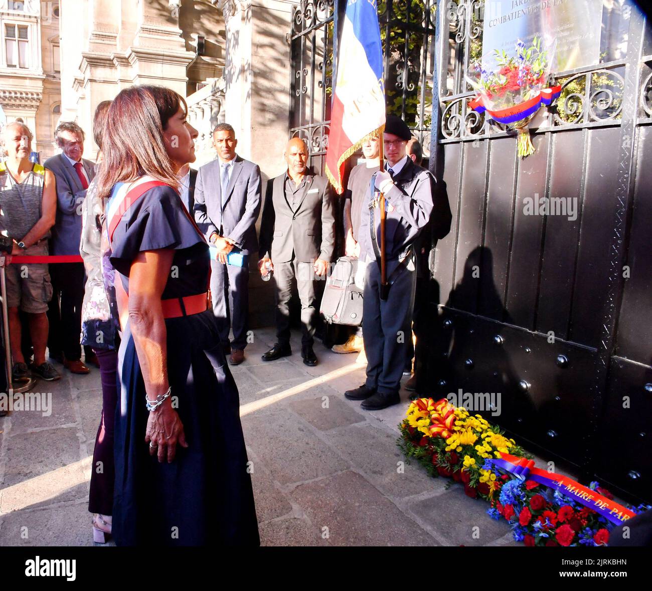 Mayor of Paris Anne Hidalgo lays a wreath at a ceremony honoring the ...