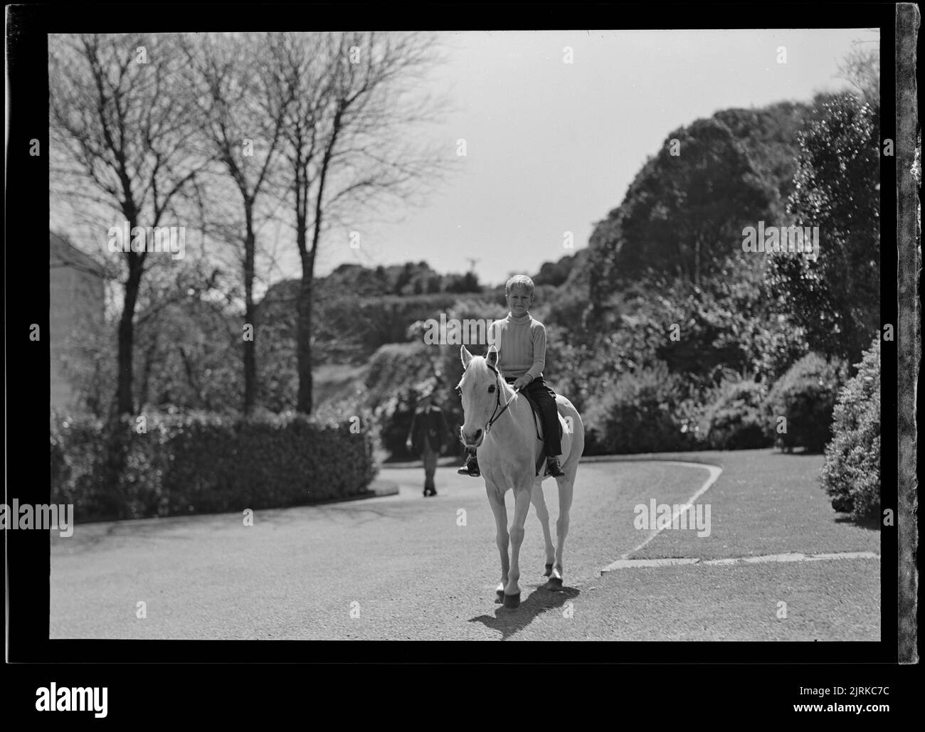 Simon Galway horseriding outside Government House, Wellington, 1939 ...