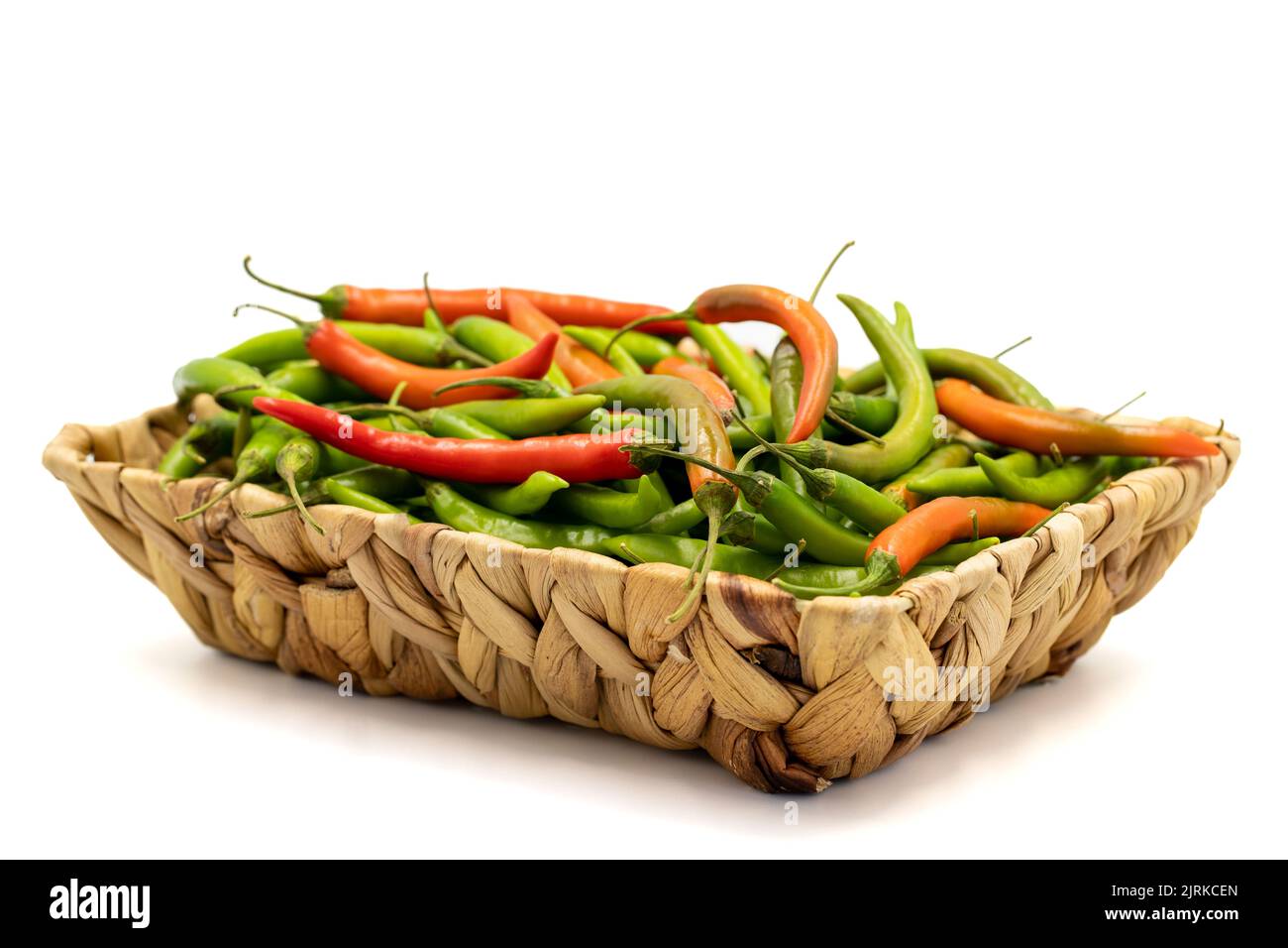 Hot peppers. Spice pepper in basket isolated on white background ...