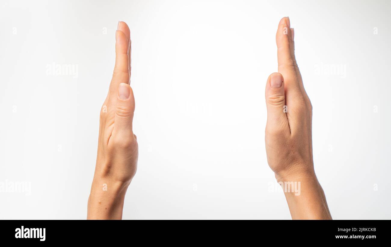 Women's hands show a wide distance with palms Stock Photo - Alamy