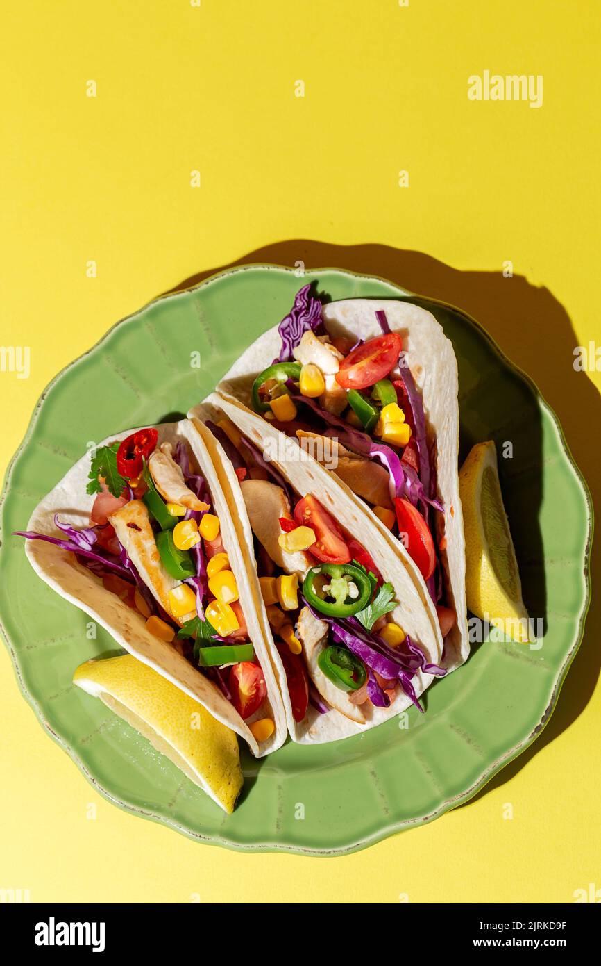 Homemade Mexican Tacos with fresh vegetables and chicken with strong ...