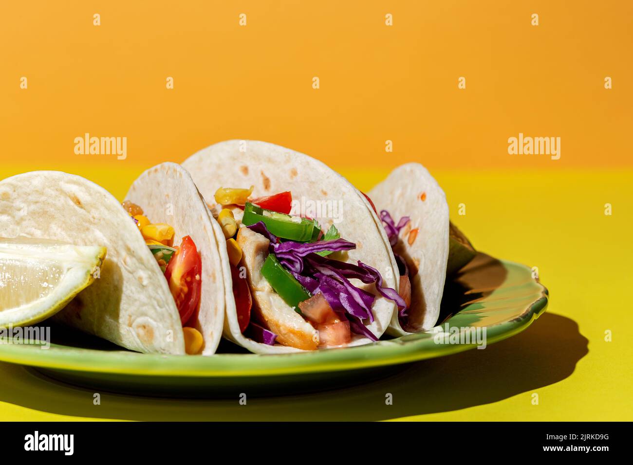 Homemade Mexican Tacos with fresh vegetables and chicken with strong ...