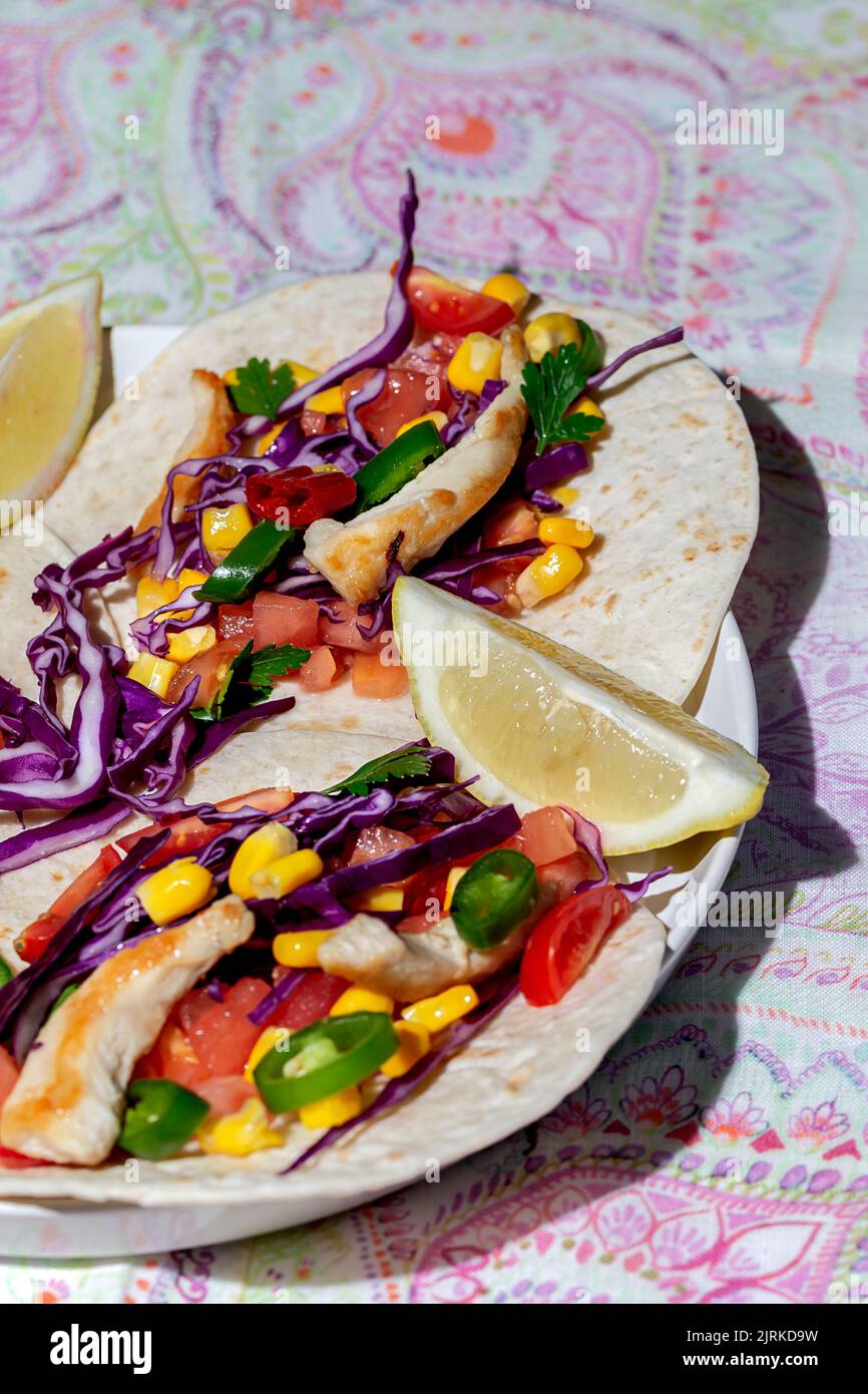 Homemade Mexican Tacos with fresh vegetables and chicken with strong ...