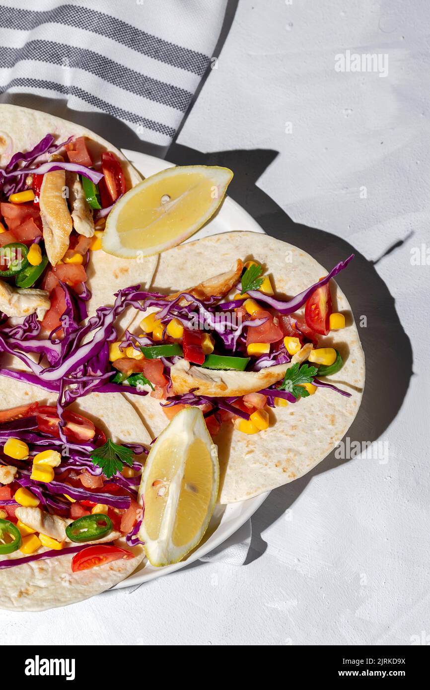 Homemade Mexican Tacos with fresh vegetables and chicken with strong ...