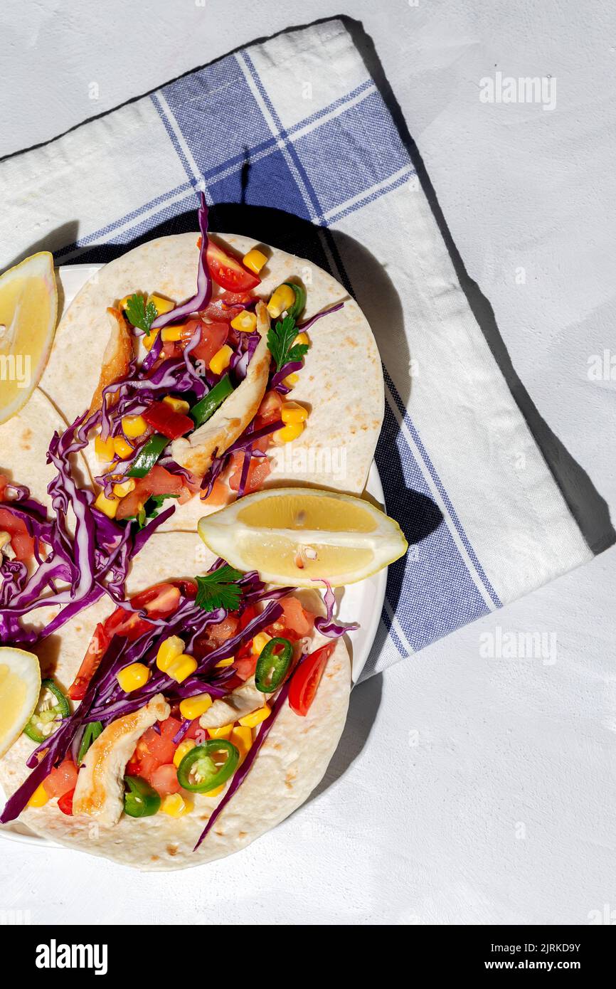 Homemade Mexican Tacos with fresh vegetables and chicken with strong ...