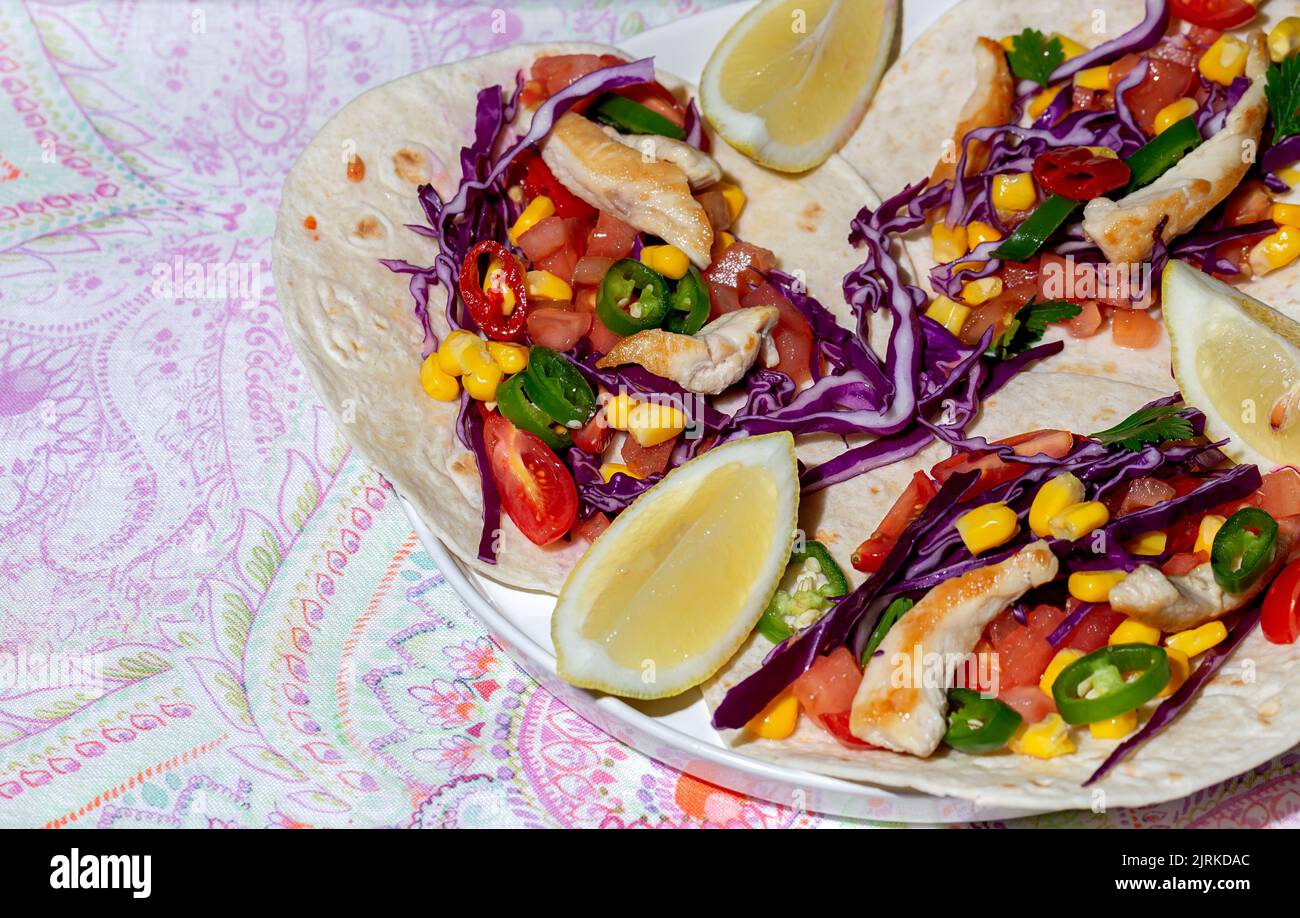 Homemade Mexican Tacos with fresh vegetables and chicken with strong ...